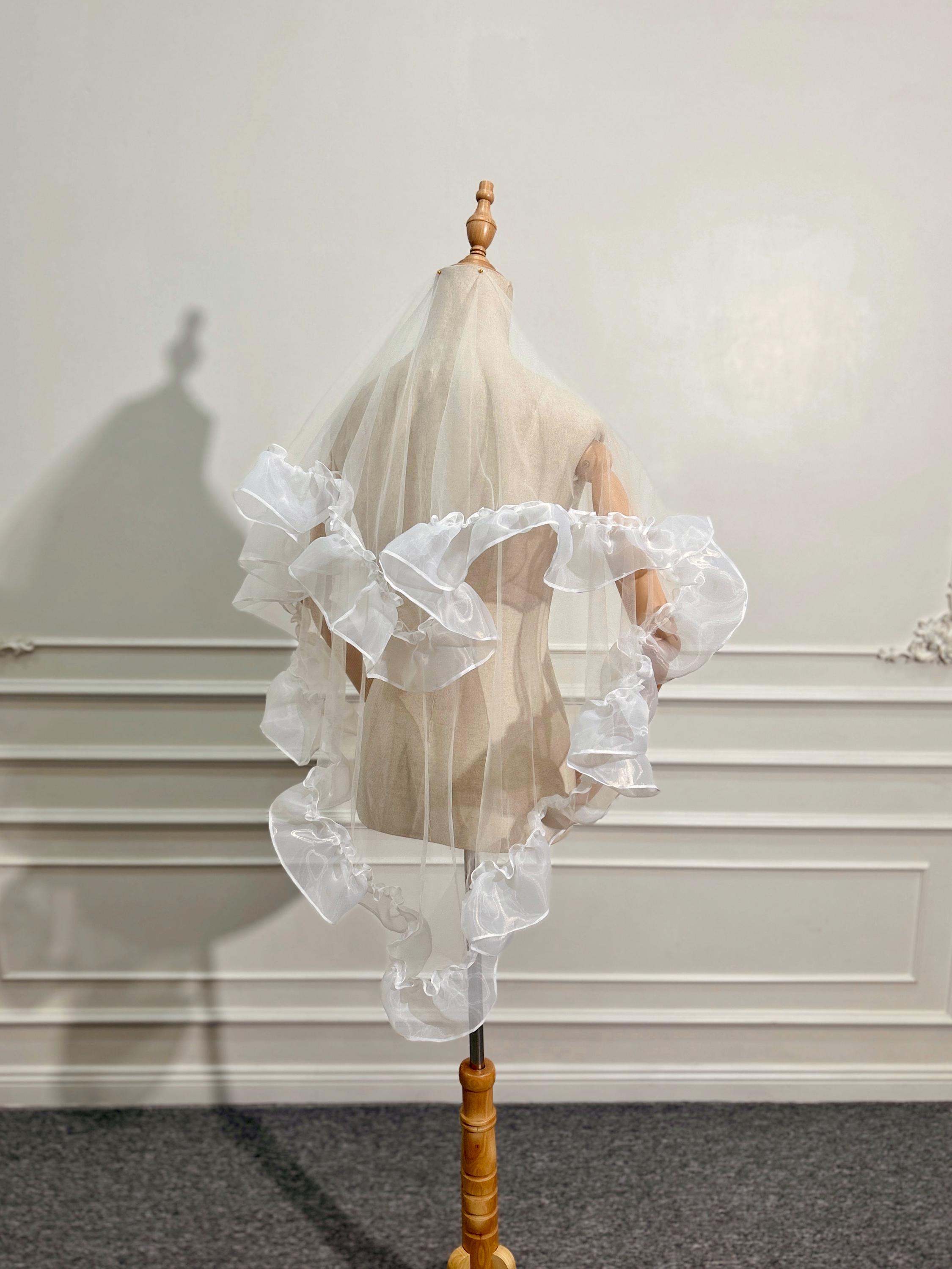 Charming Heart-shaped Veil: A Heart-shaped Fringed Veil in Tulle and ...