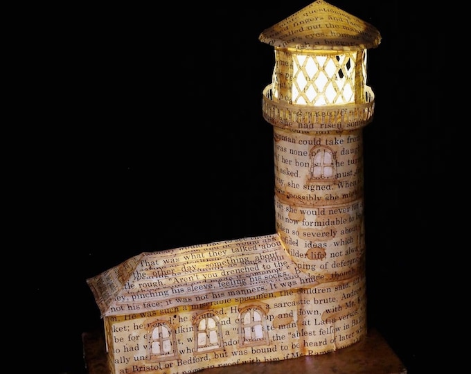 Justin Rowe paper sculptures and book art. by daysfalllikeleaves