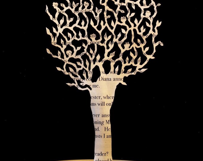 Justin Rowe paper sculptures and book art. by daysfalllikeleaves