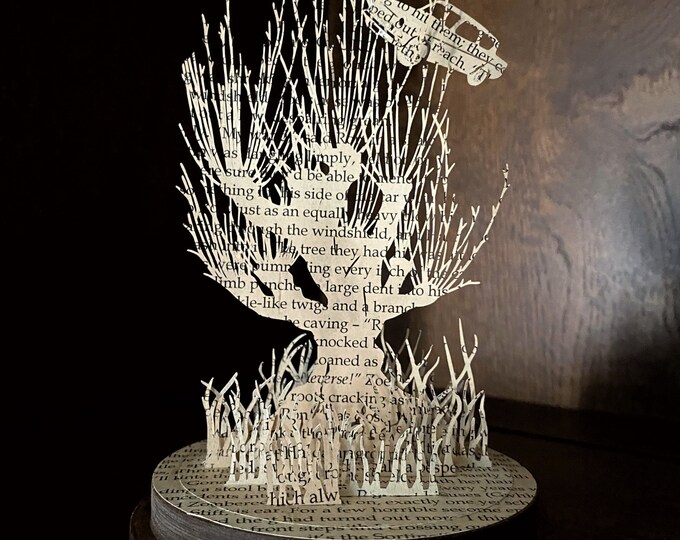 Justin Rowe paper sculptures and book art. by daysfalllikeleaves