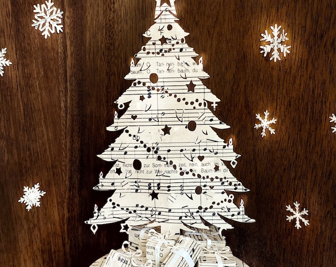 Justin Rowe paper sculptures and book art. by daysfalllikeleaves