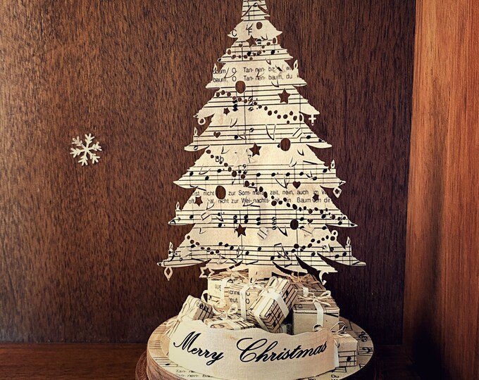 Justin Rowe paper sculptures and book art. by daysfalllikeleaves