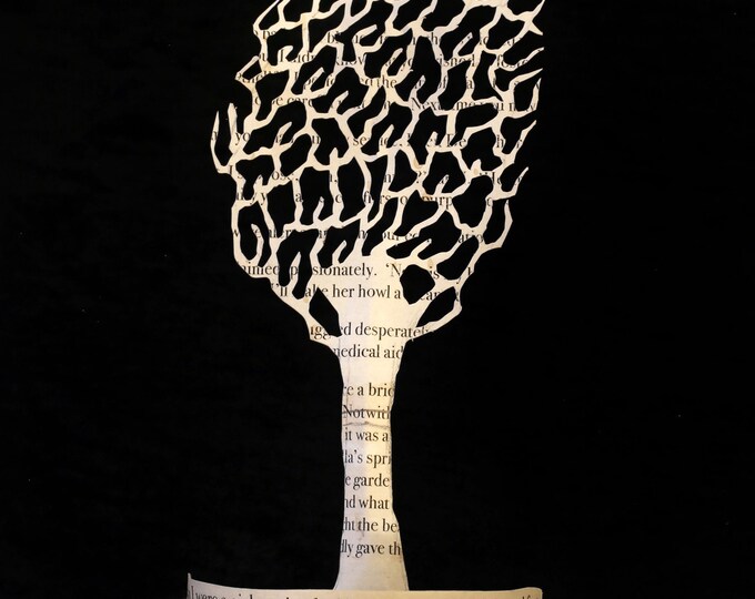 Justin Rowe paper sculptures and book art. by daysfalllikeleaves