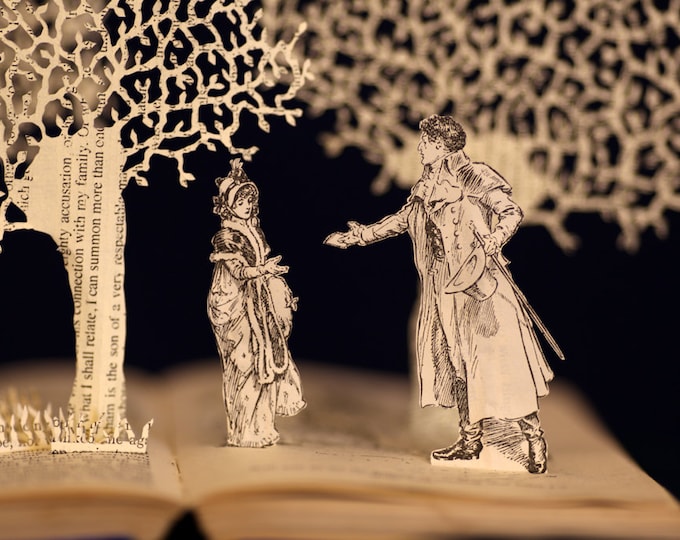 Justin Rowe paper sculptures and book art. by daysfalllikeleaves