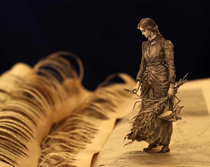 Justin Rowe paper sculptures and book art. by daysfalllikeleaves