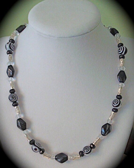 Items similar to Black Swirl "Hypnosis" Necklace on Etsy
