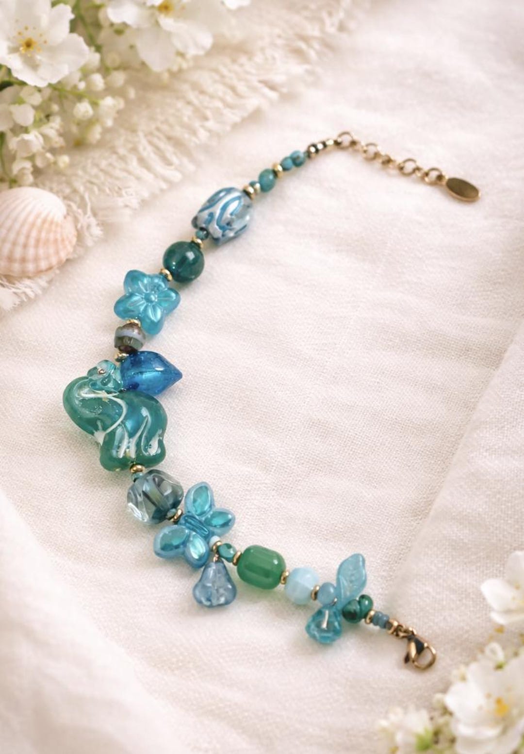 Handmade Teal Beaded Bracelet, Lucky Elephant Charm With Floral Details ...