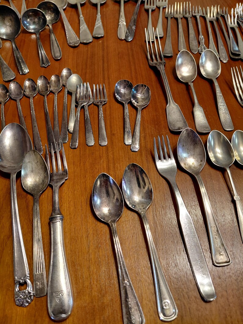 Mixed Lot of 102 Pieces of Silver Plate Flatware and Serving Pieces A ...