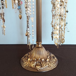 Long necklace stand store