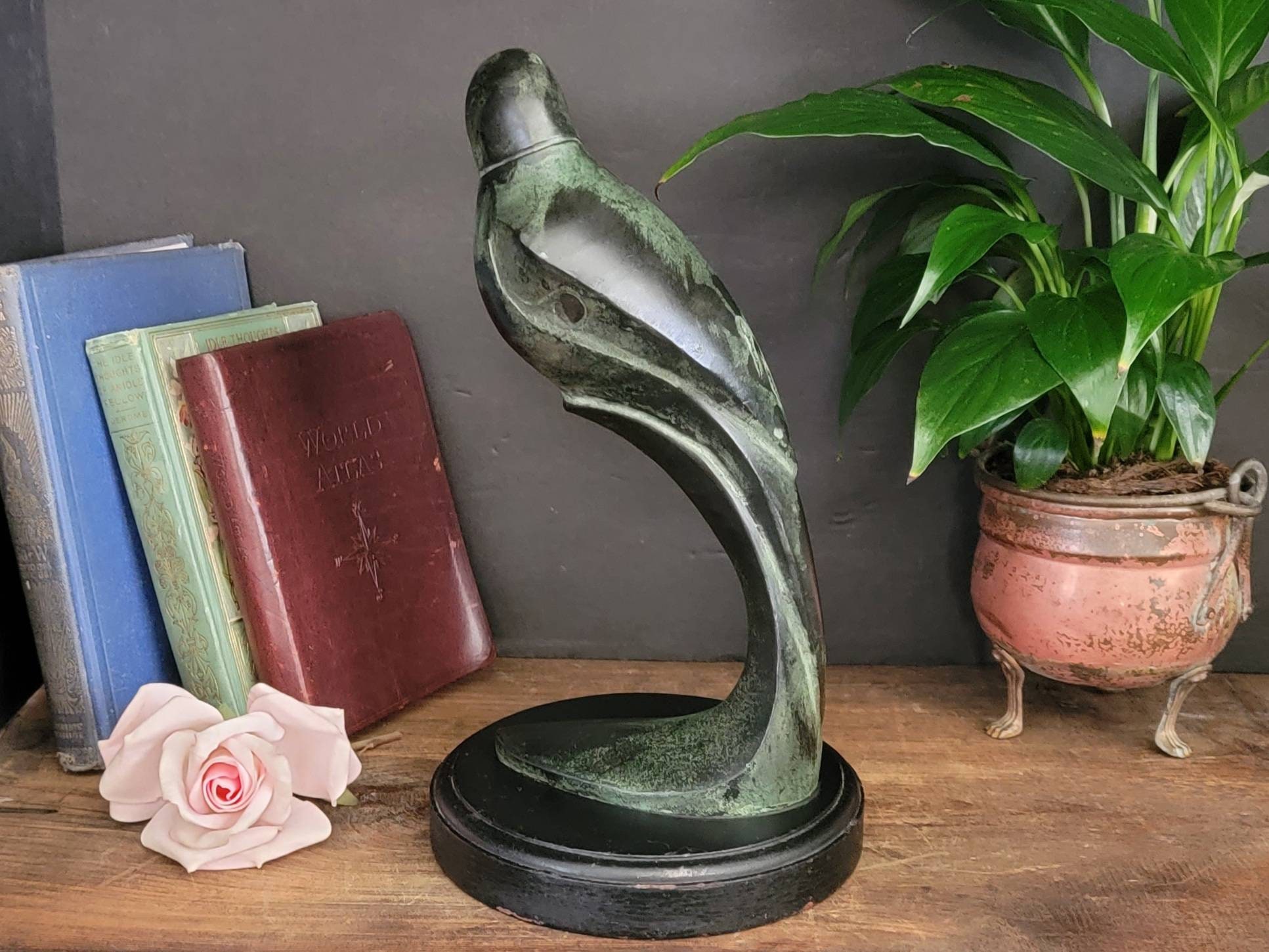 Metal Parrot Sculpture With Green Patina and Brass Colored Beak on Wood ...