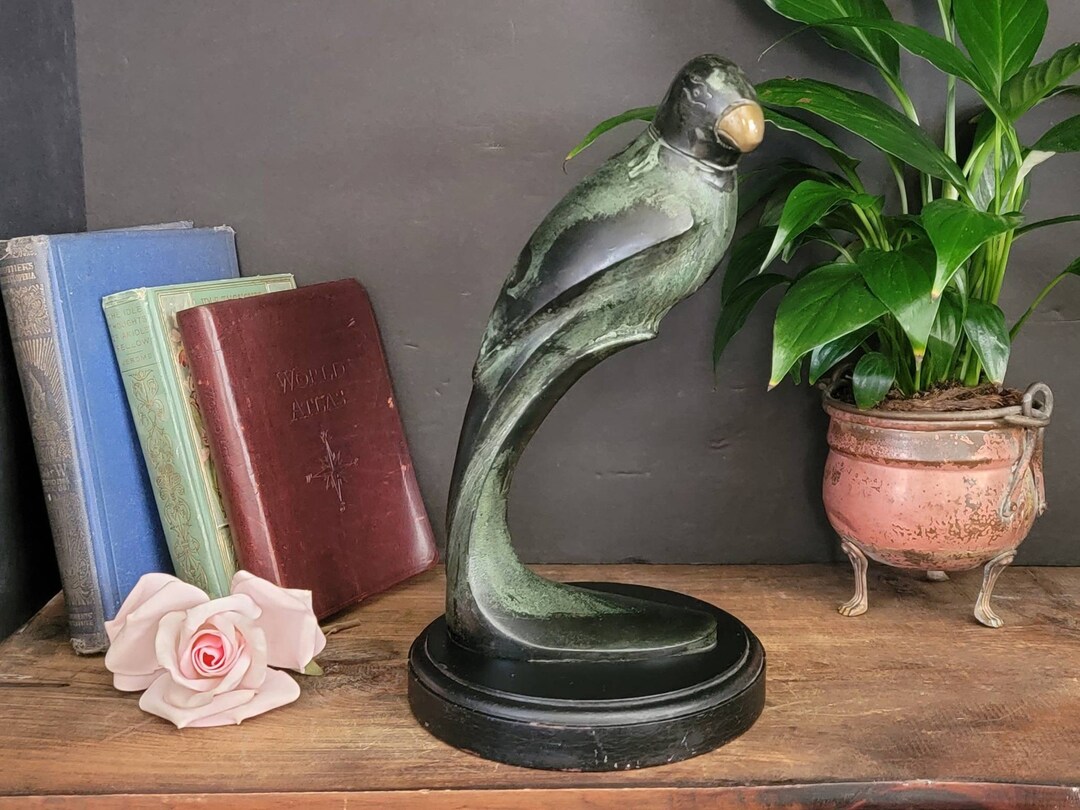 Metal Parrot Sculpture With Green Patina and Brass Colored Beak on Wood ...
