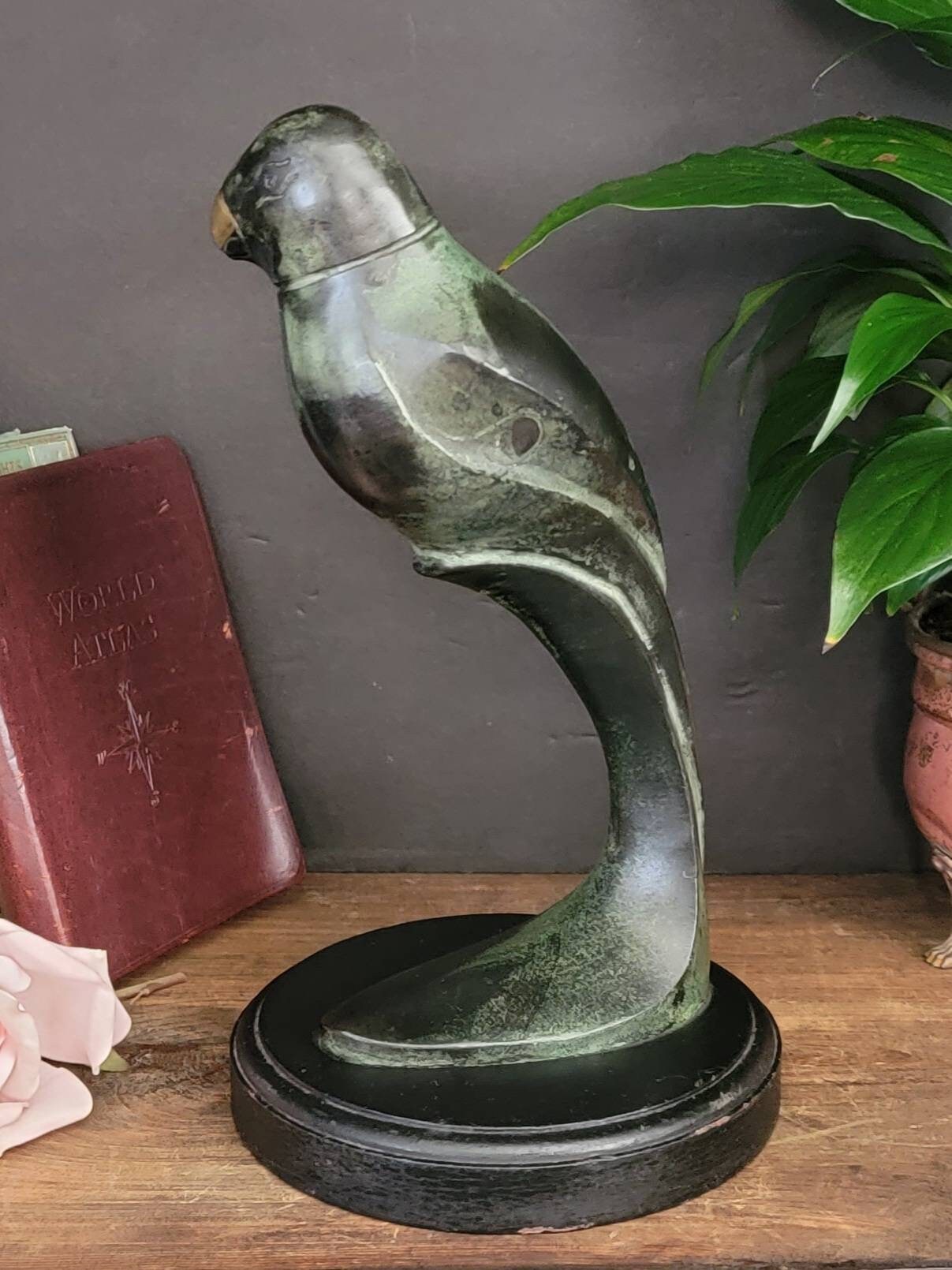 Metal Parrot Sculpture With Green Patina and Brass Colored Beak on Wood ...