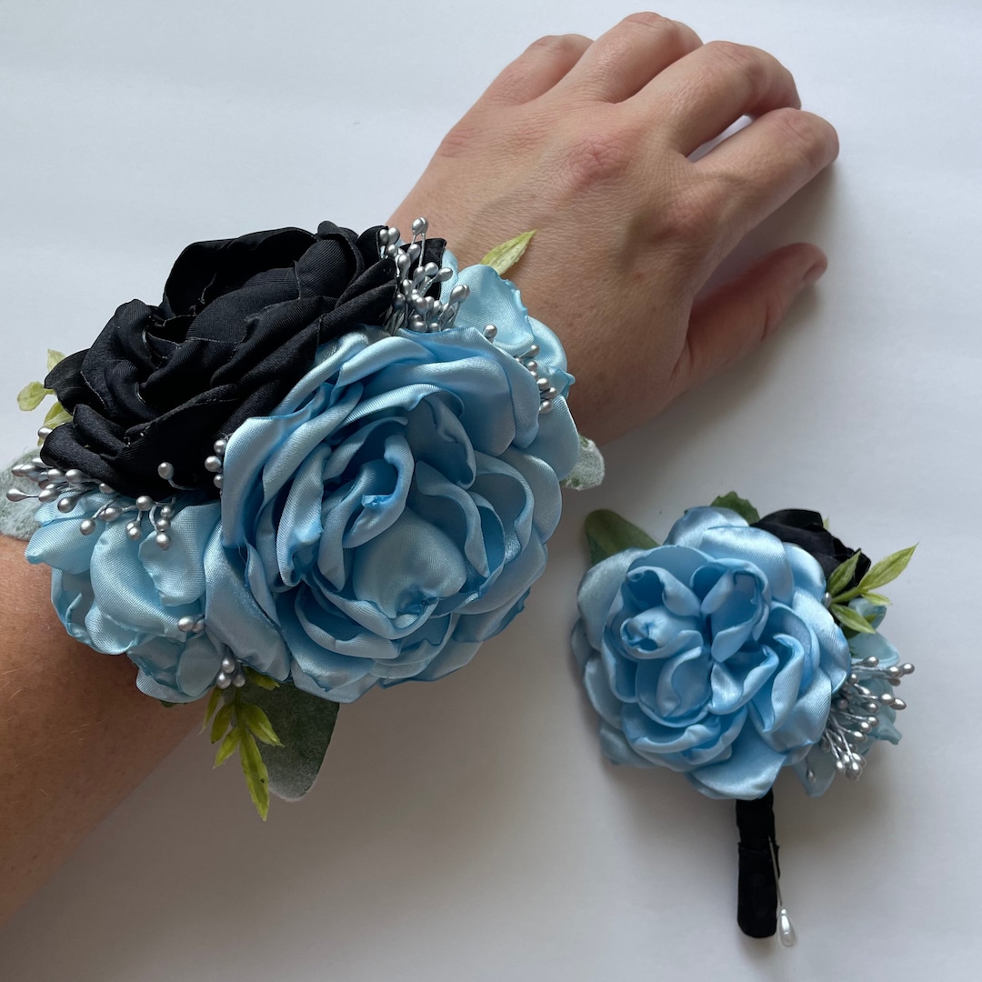 Baby Blue and Black Corsage or Boutonnière With Greenery - Blue Roses ...