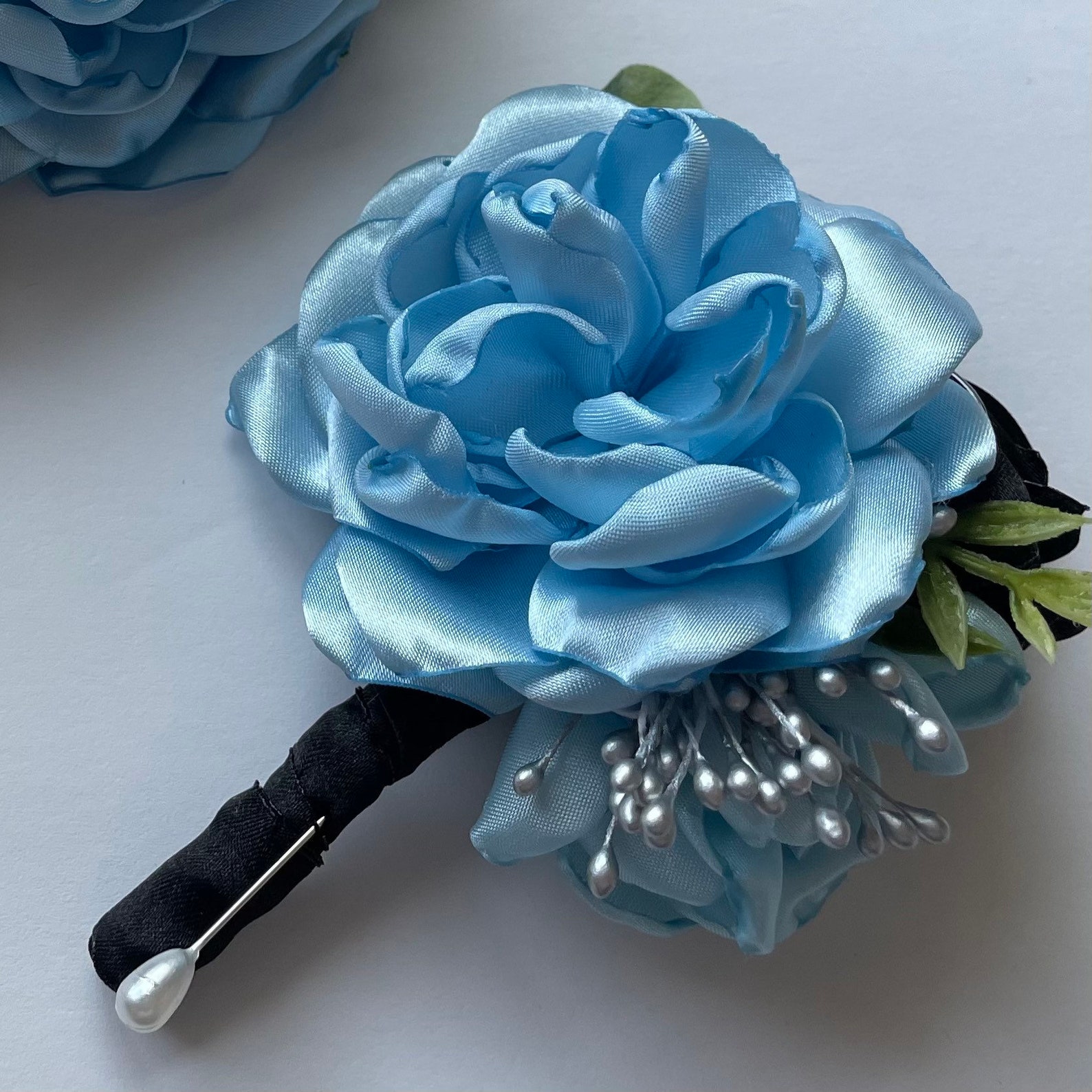 Baby Blue and Black Corsage or Boutonnière With Greenery - Etsy