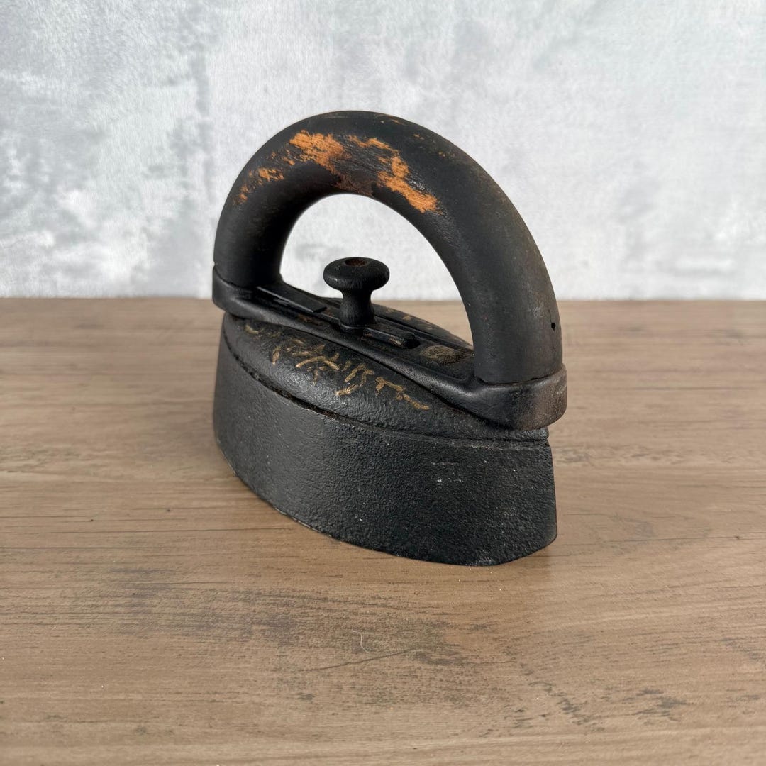 Antique Cast Iron Sad Iron With Wooden Handle and Gold Floral Accents ...