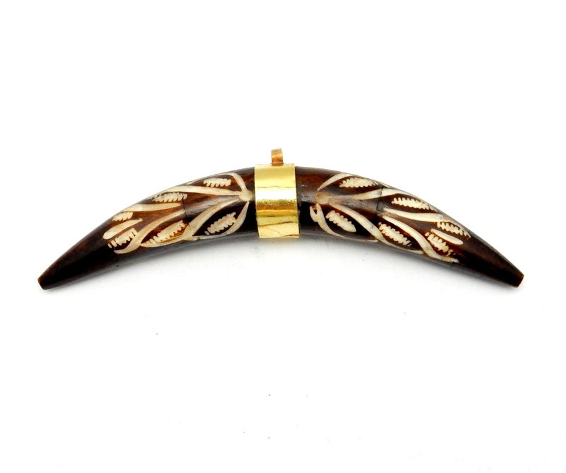 Brown Bone Carved Sideways Horn Pendant With Carved Leaf Accents and ...