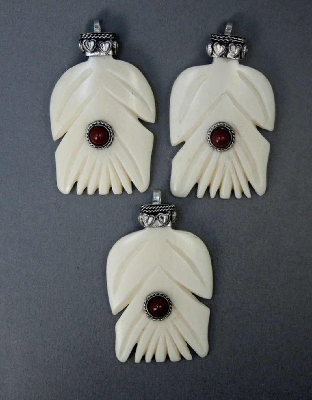 Bone Wing Pendant With Brown Gemstone Inlay and Silver Toned Cap and ...