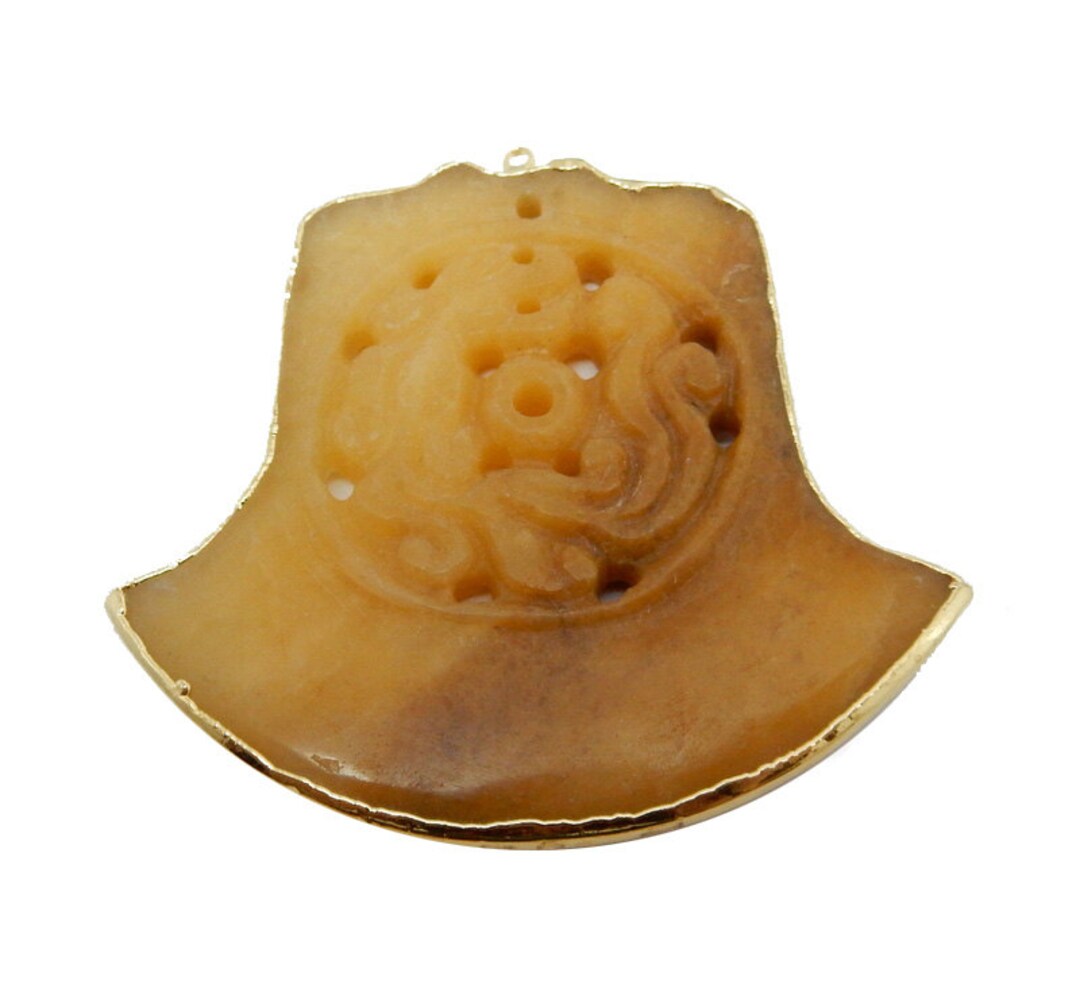 Tan Jade Shield Pendant With Intricate Carved Center Design Edged With ...