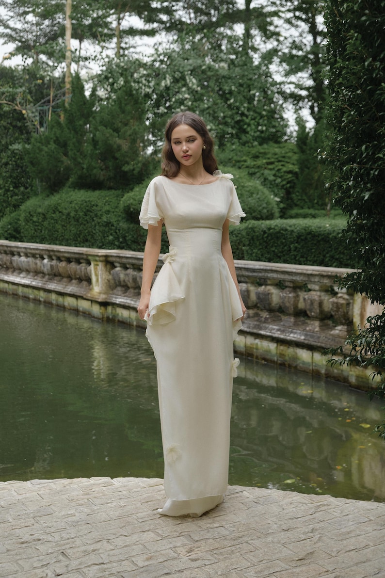 HANGKAO_ SELLY Dress, A Thigh Slit Design With Ruffled Panels, Adorned ...