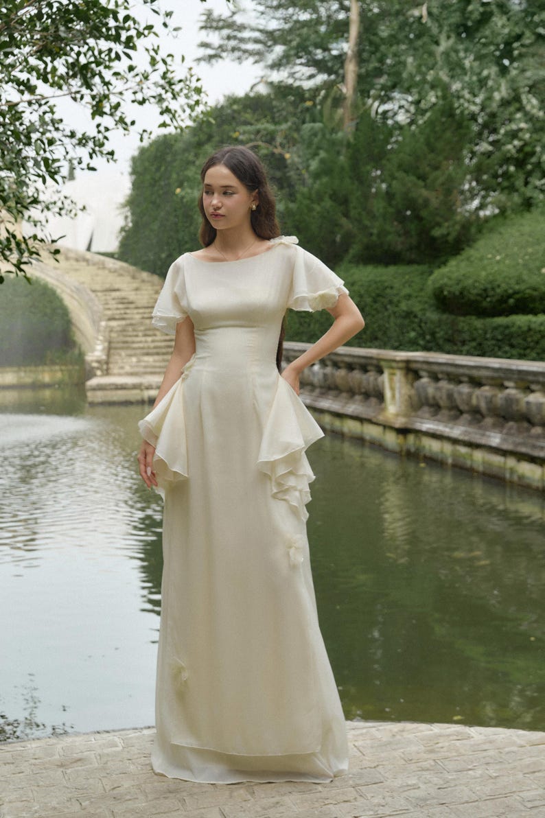 HANGKAO_ SELLY Dress, A Thigh Slit Design With Ruffled Panels, Adorned ...