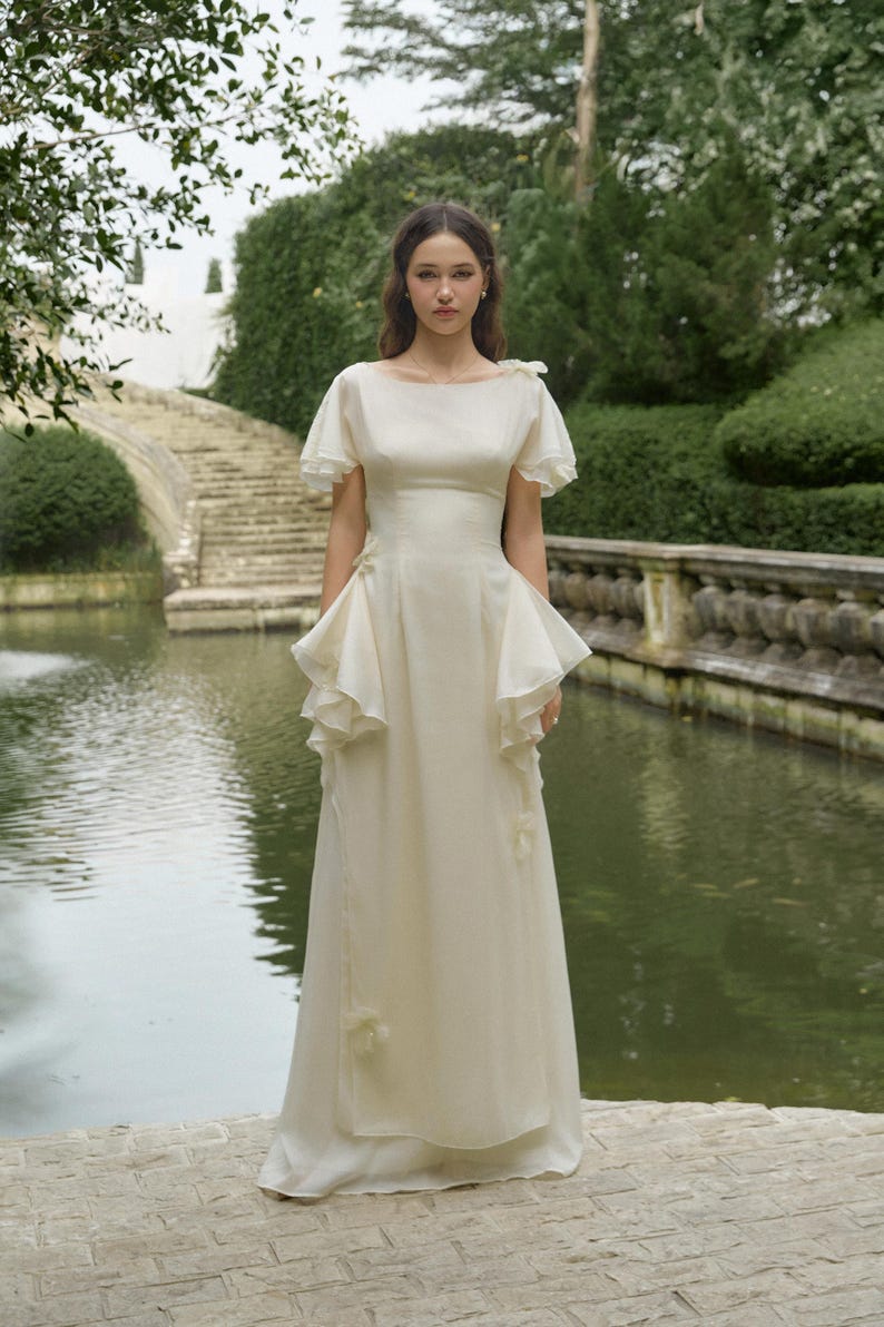 HANGKAO_ SELLY Dress, A Thigh Slit Design With Ruffled Panels, Adorned ...