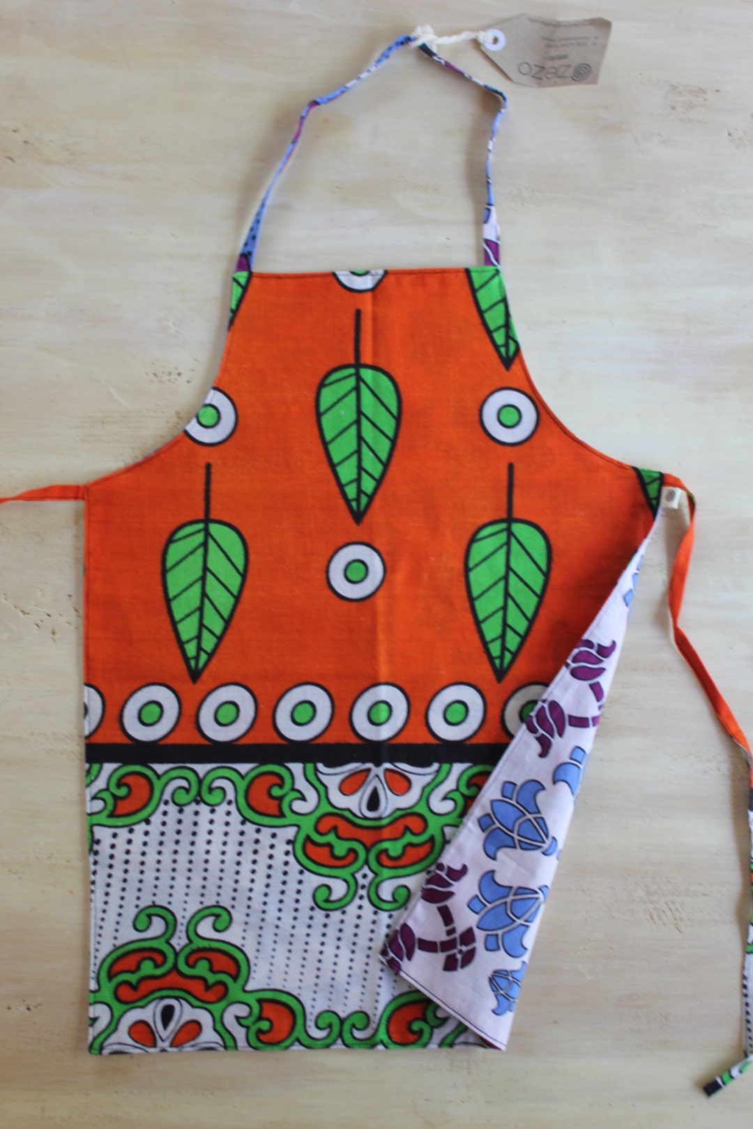 Reversible Child Apron, African Khanga - Orange Leaves and Blue Purple ...