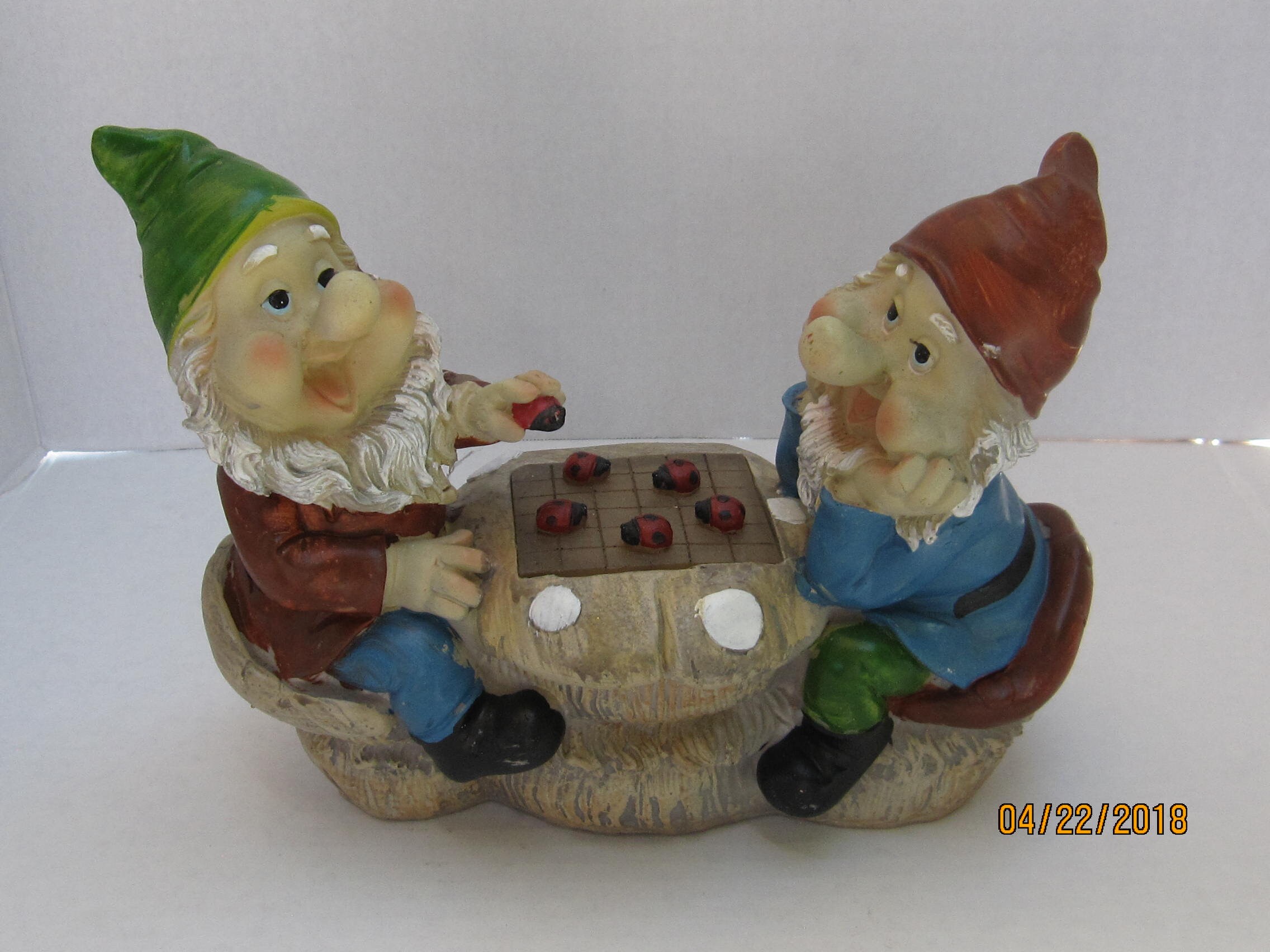 Cute Solar Gnome playing Tic Tac Toe