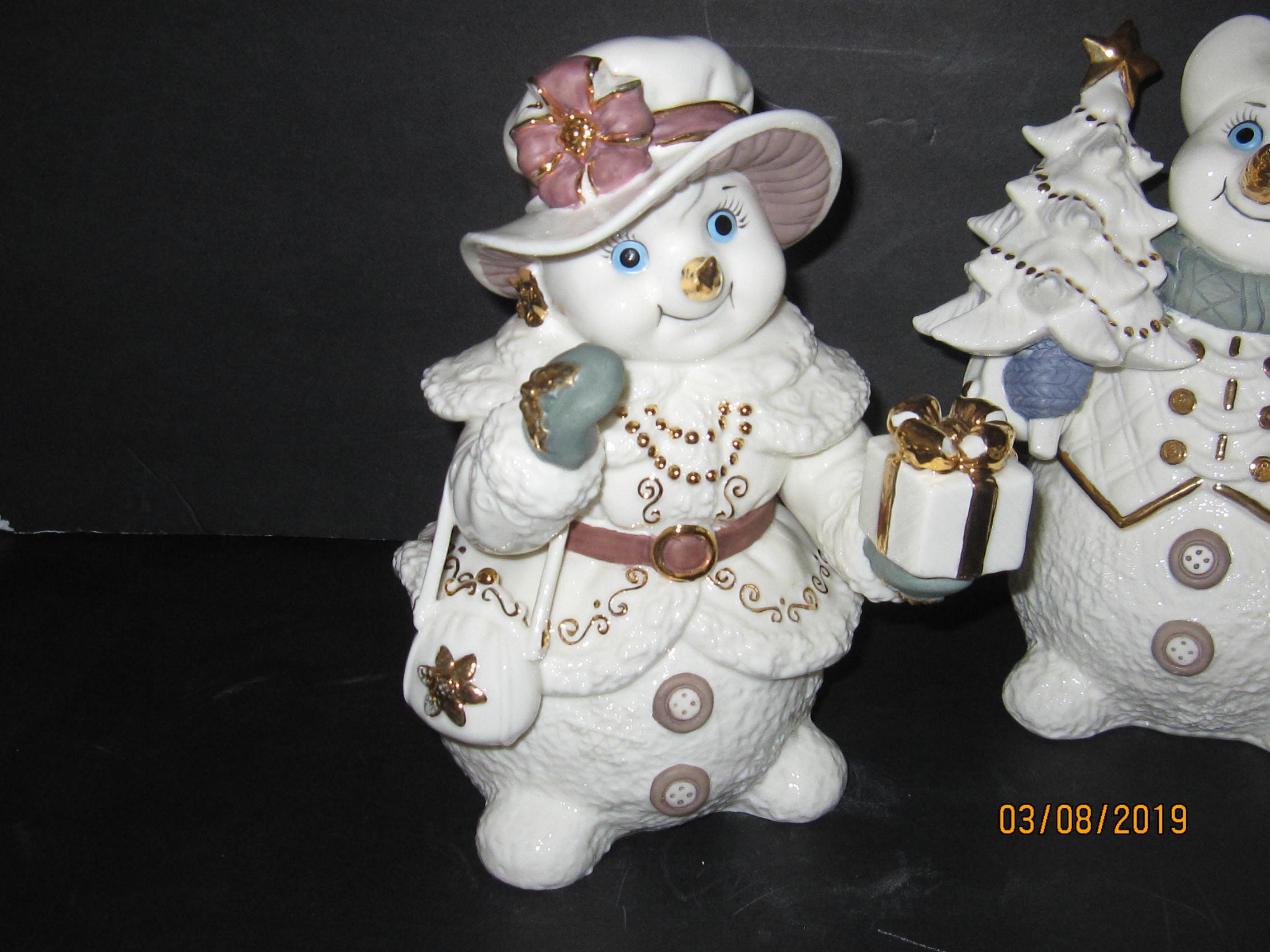 Christmas Porcelain Snowman Family Collectors Edition.