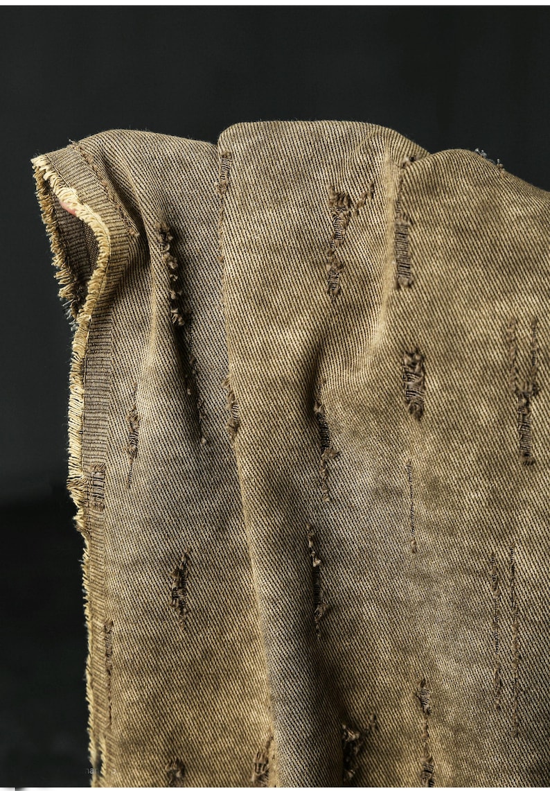 Tawny Vintage Distressed Denim Fabric With Fine Holes Creative Canvas ...