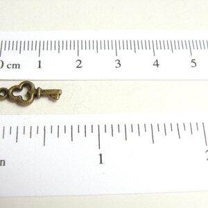 20 Clover Skeleton Key Small Charms Antique Bronze 16x6mm DB06577 - Etsy