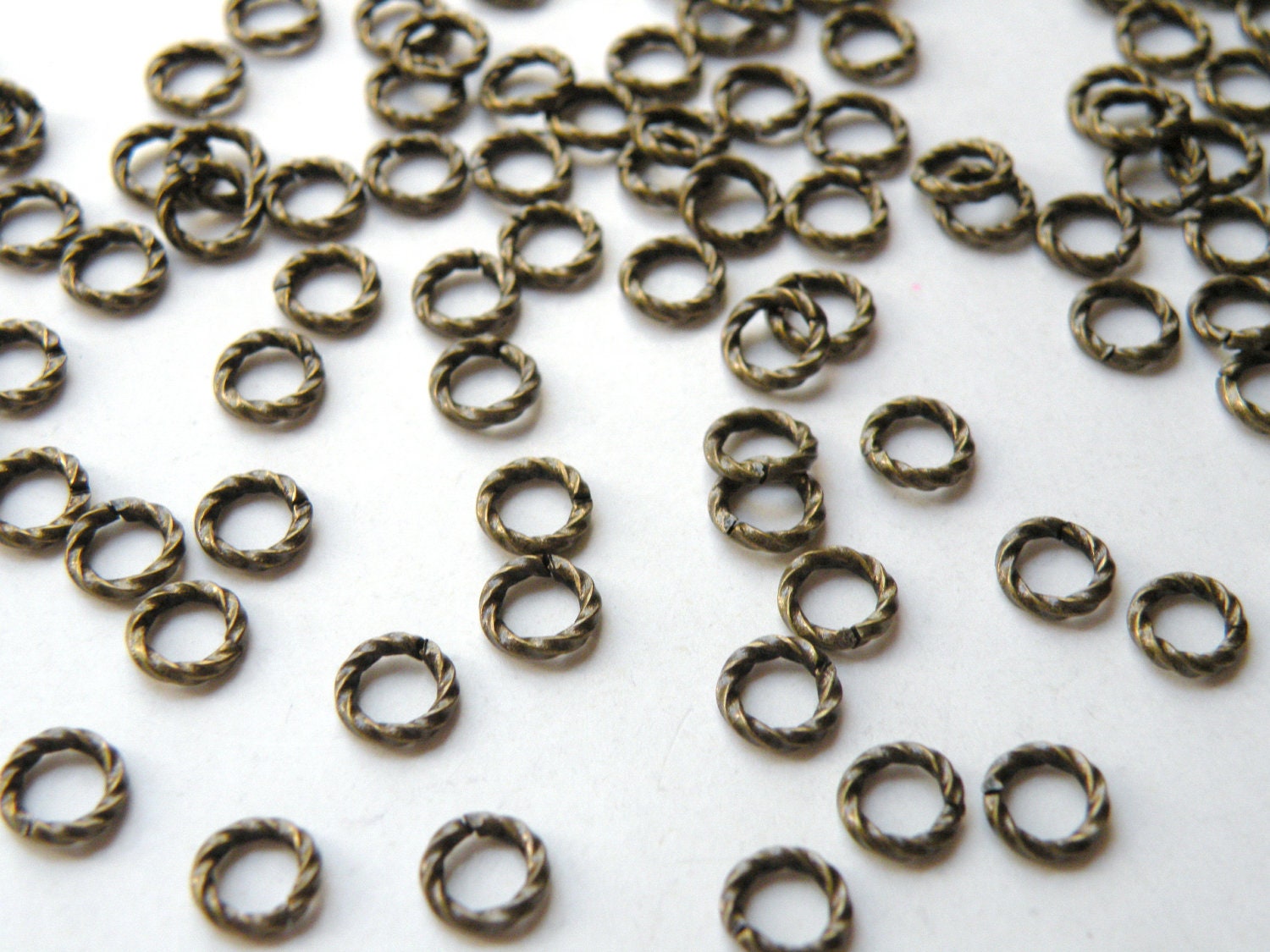 25 Fancy twisted jump rings round open antique bronze antique | Etsy