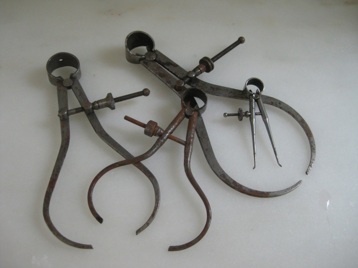 Vintage rusty calipers a jumble of 4 stored in an old barn | Etsy