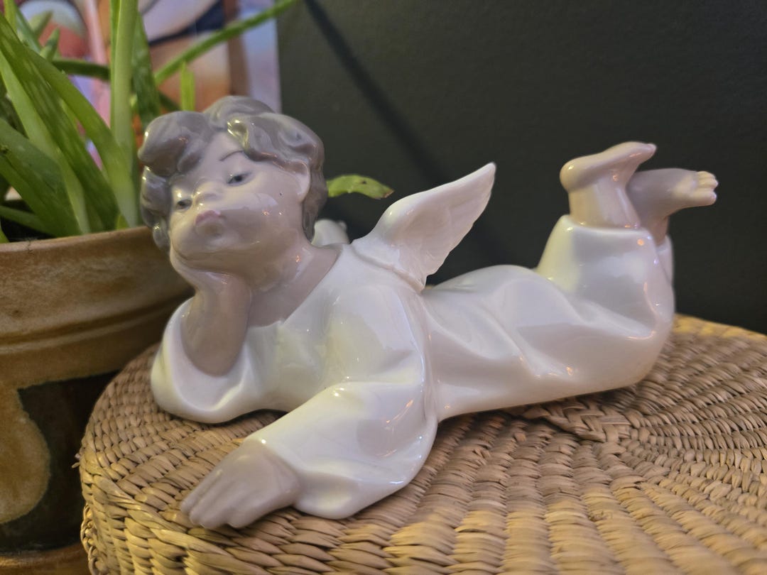 Retired Lladró "angel Laying Down" or "angel Reclining" Porcelain ...