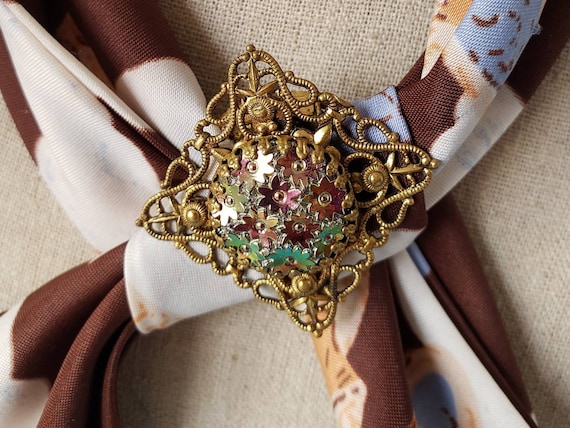 1960s Scar Clip with Irridescent Flowers Made in West… - Gem