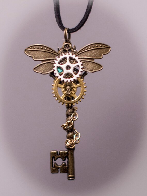 Steampunk firefly key necklace cogs | Etsy