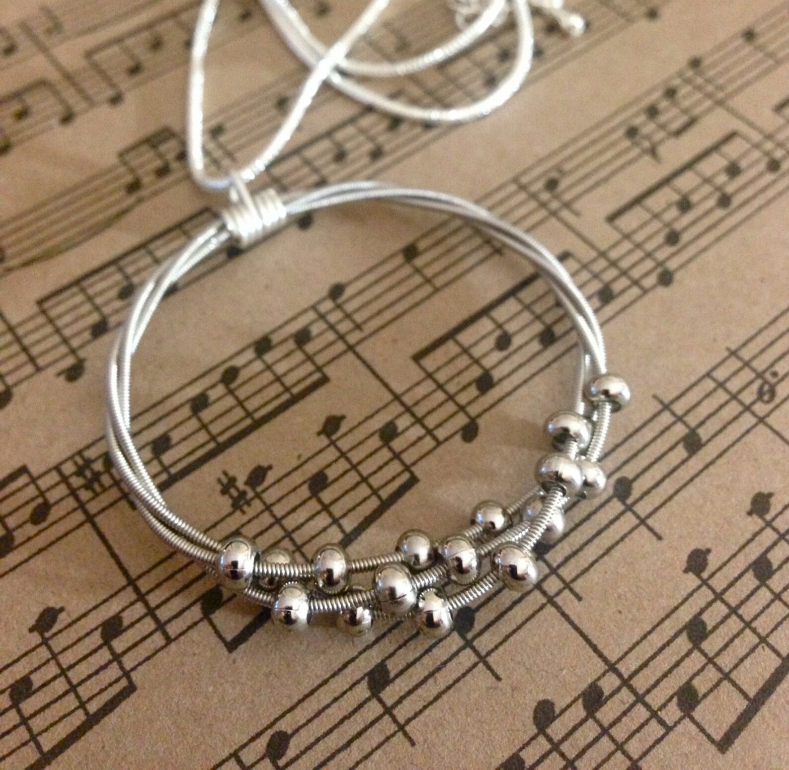 Floating Melody Guitar String Necklace - Etsy