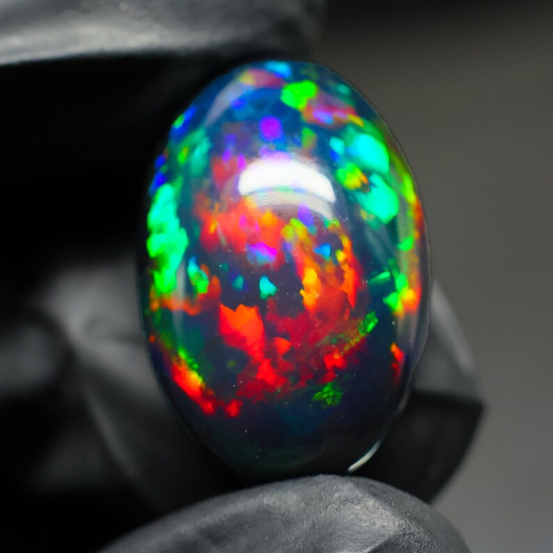 Buy Ethiopian Black Smoked Opal Cabochon, 13.60 Carat Oval Opal ...