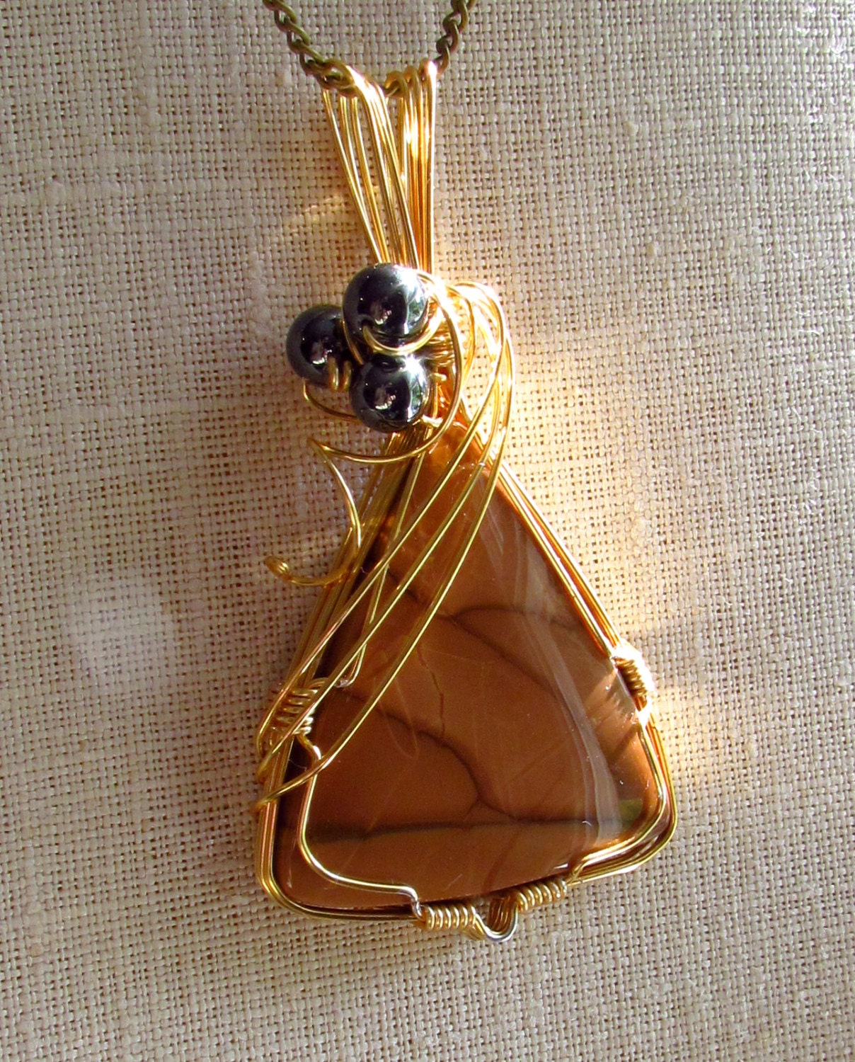 Bruneau Jasper Triangular Cabochon Wire Wrapped in Golden German Style ...