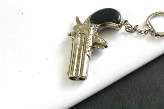 Vintage 1980s Victory Derringer revolver keychain, mi… - Gem