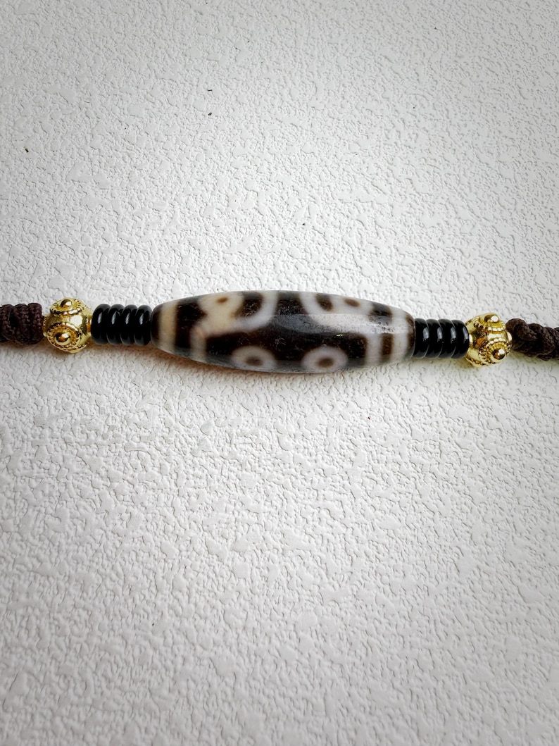 Tibetan Seven-eyed Dzi Bead Necklace | Old Mine Agate, Totem Symbolism ...