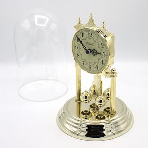 Vintage Anniversary Clock Glass Dome Brass Tone Spinning Weight ...