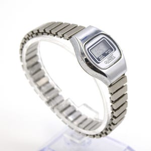 Vintage 1980s Quintel Digital Watch Chrome Silver LCD Quartz Wristwatch ...