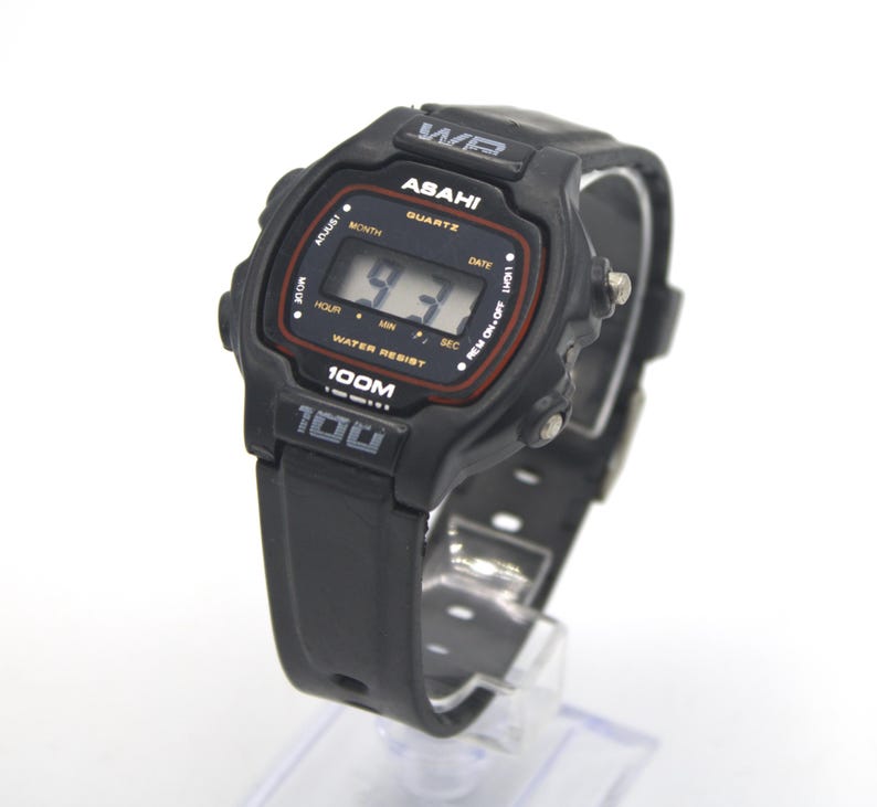 Vintage Asahi Digital Sports Watch 100m Water Resistant LCD Time Date ...