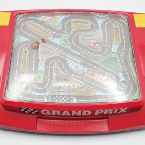 Vintage Electronic Handheld Racing Game Grand Prix Mini Auto Race ...