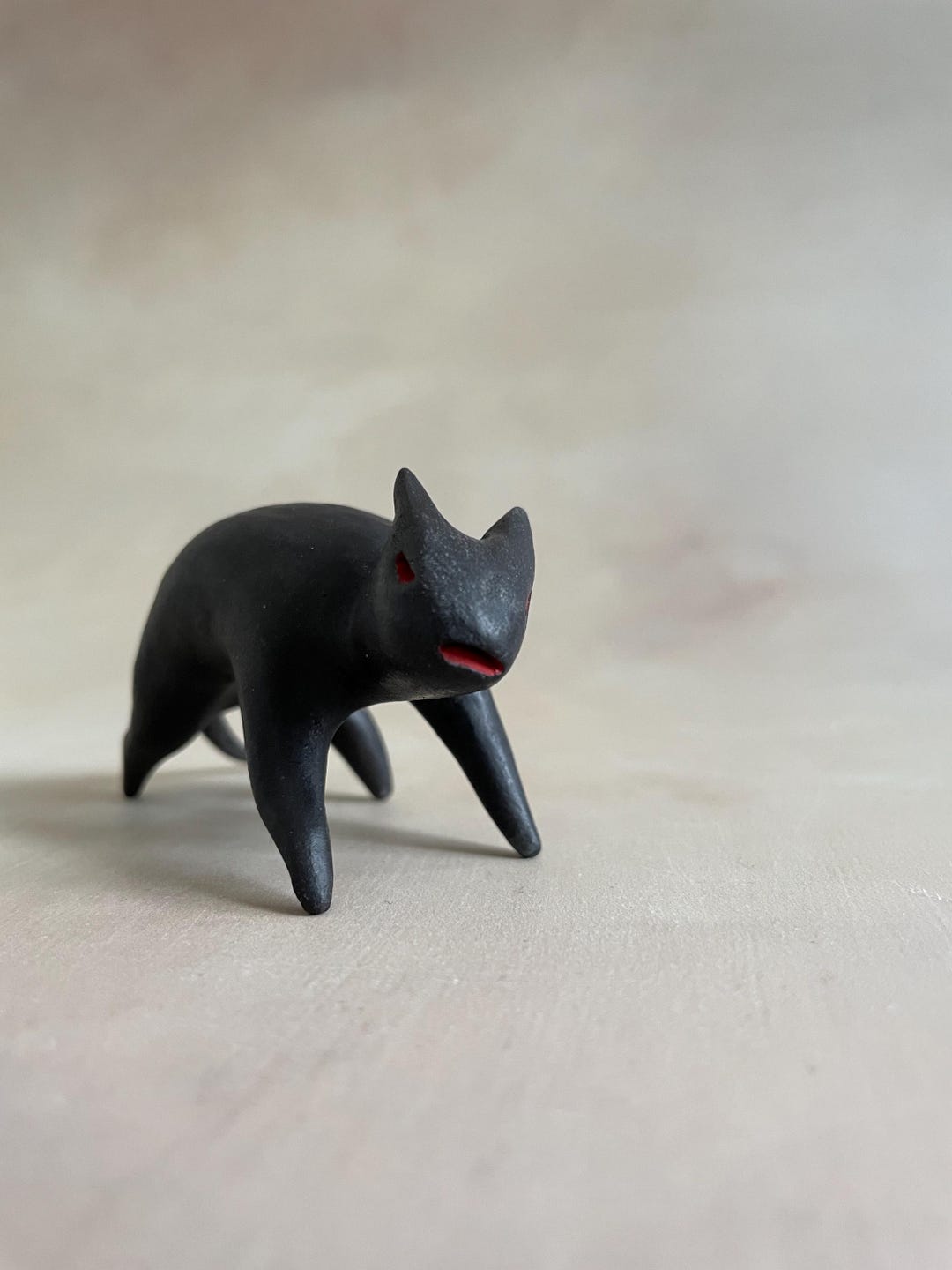 Black Porcelain Sculpture - Mischievous Beast - Etsy