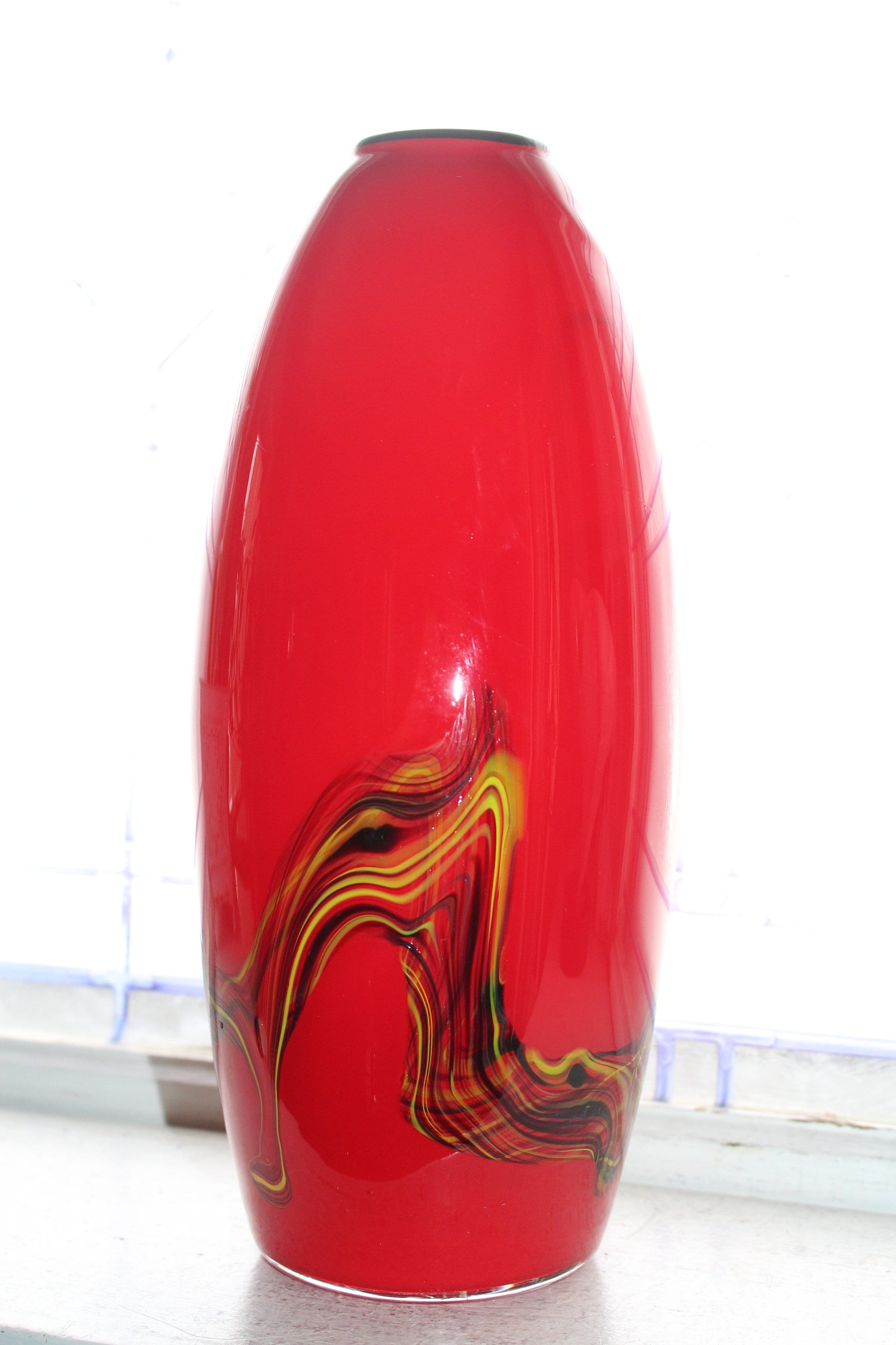 Vintage Art Glass Red Vase with Colored Swirls and Black Rim