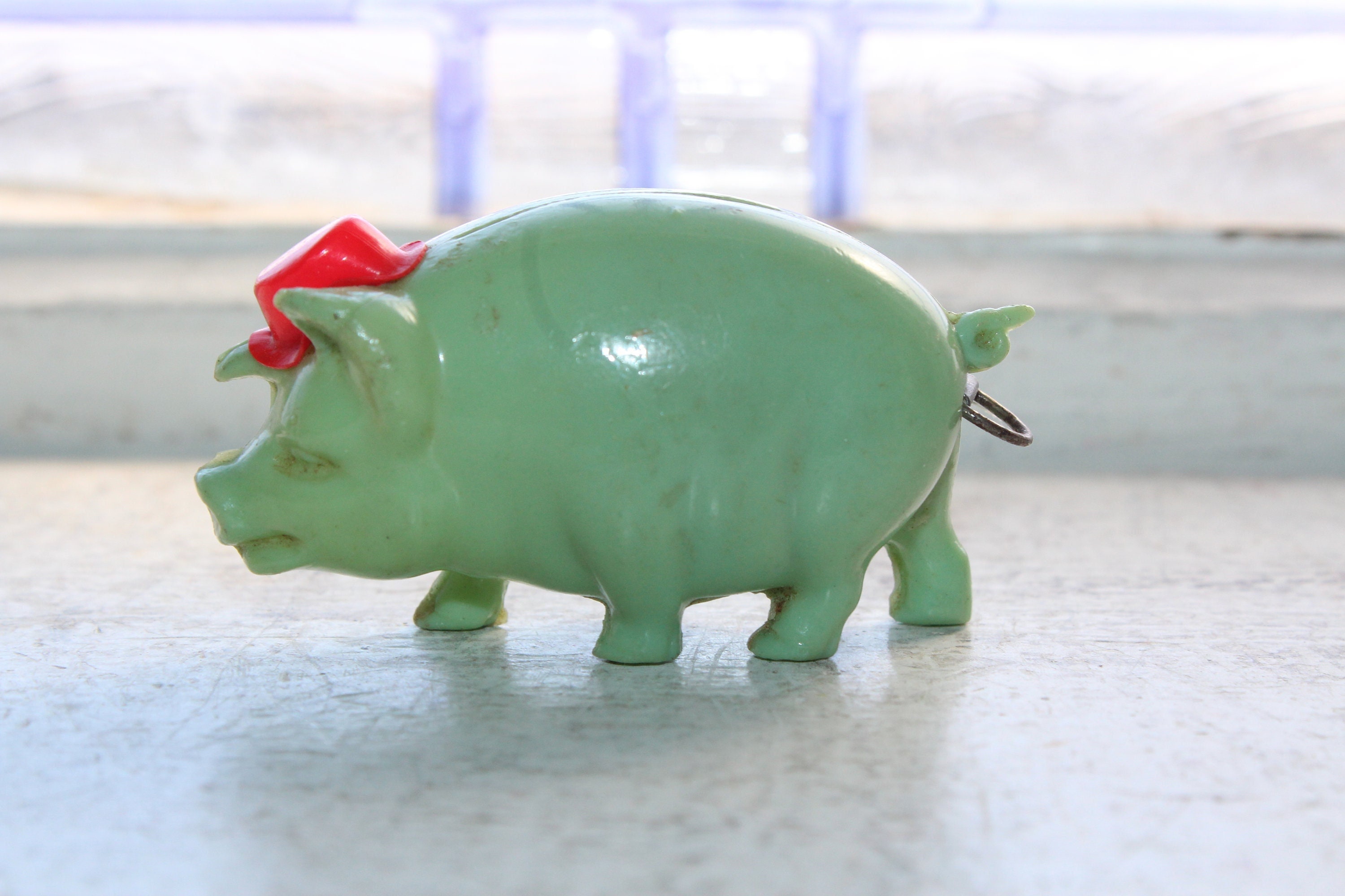 Vintage 1920s Celluloid Tape Measure Green Pig with Red Tophat
