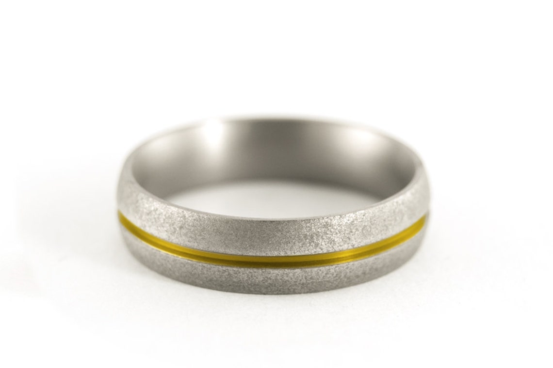 Sandblasted titanium ring with golden anodized inlay. Titanium | Etsy