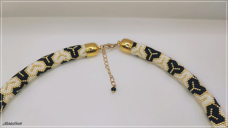 White, Black, and Golden Geometric Pattern Necklace, Ornamented Bead ...