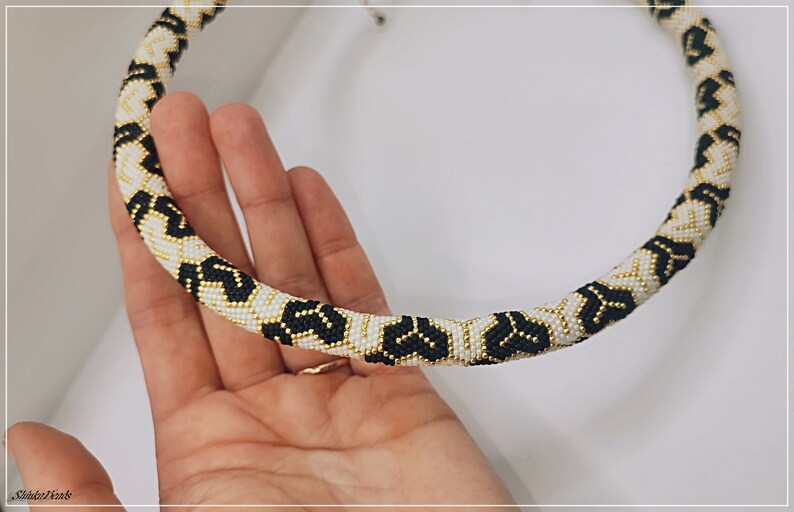 White, Black, and Golden Geometric Pattern Necklace, Ornamented Bead ...